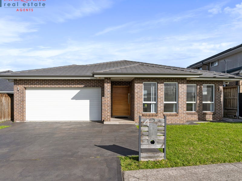 42 Pioneer Drive, Carnes Hill, NSW 2171 - realestate.com.au